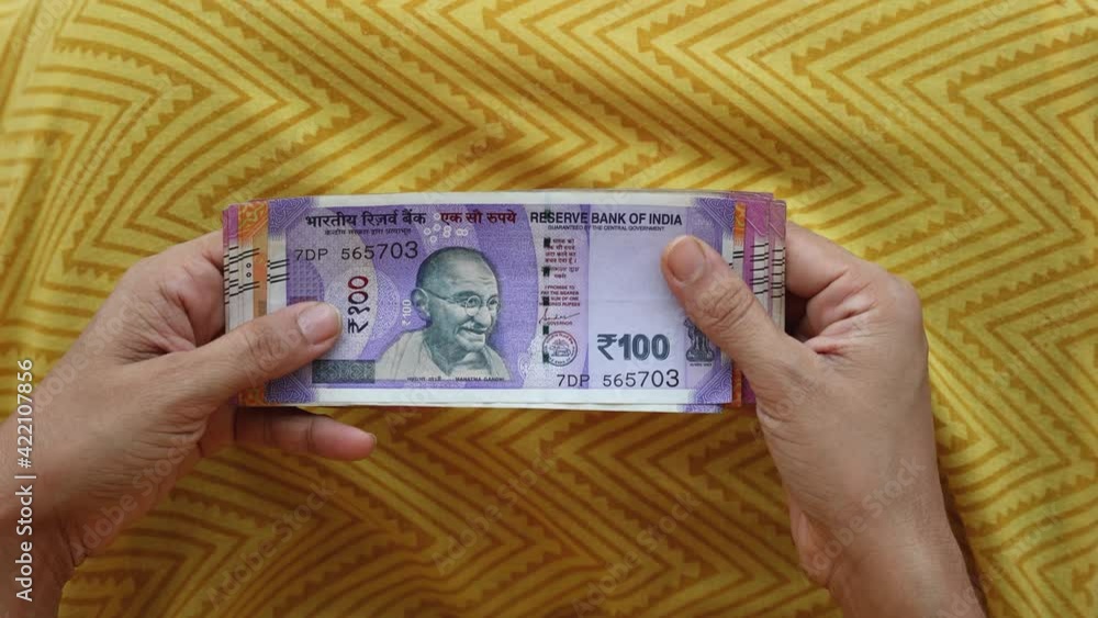 Counting Indian currency Rupee , hand giving Indian money 100, 200 ...