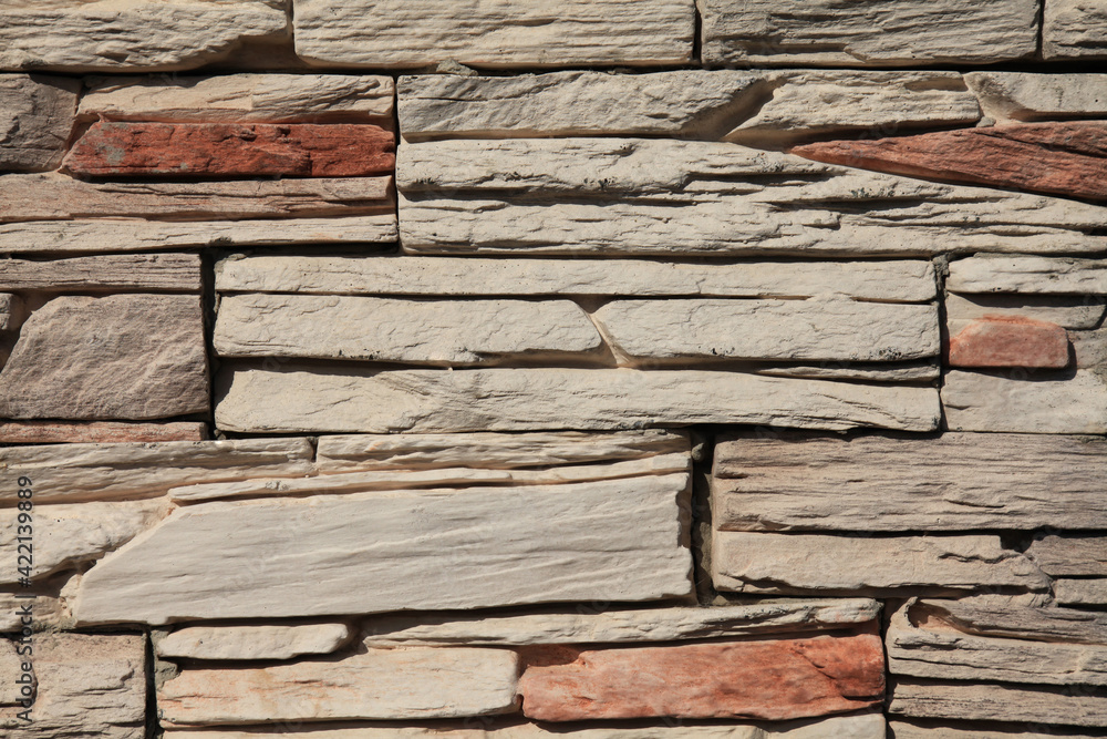 Decorative wall texture, background. Stone cladding in different colors ...