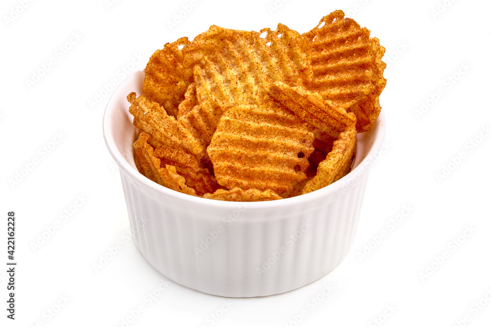 Deep Fried ridged potato chips with paprika, isolated on white ...