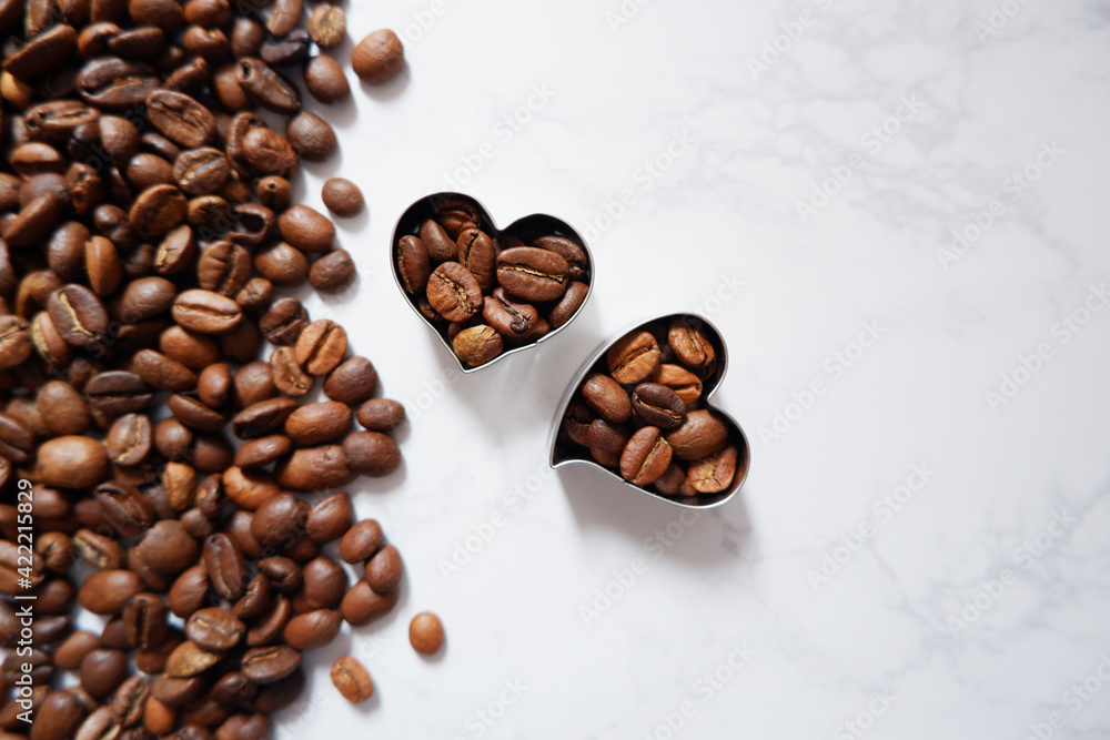 Love coffee concept. Coffee beans and Heart symbol on a marble ...