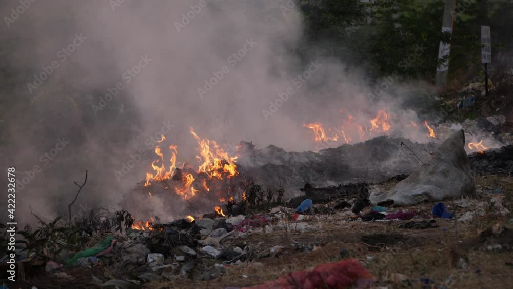 Smoke due to burning of waste, Fire and smoke due to burning of waste ...