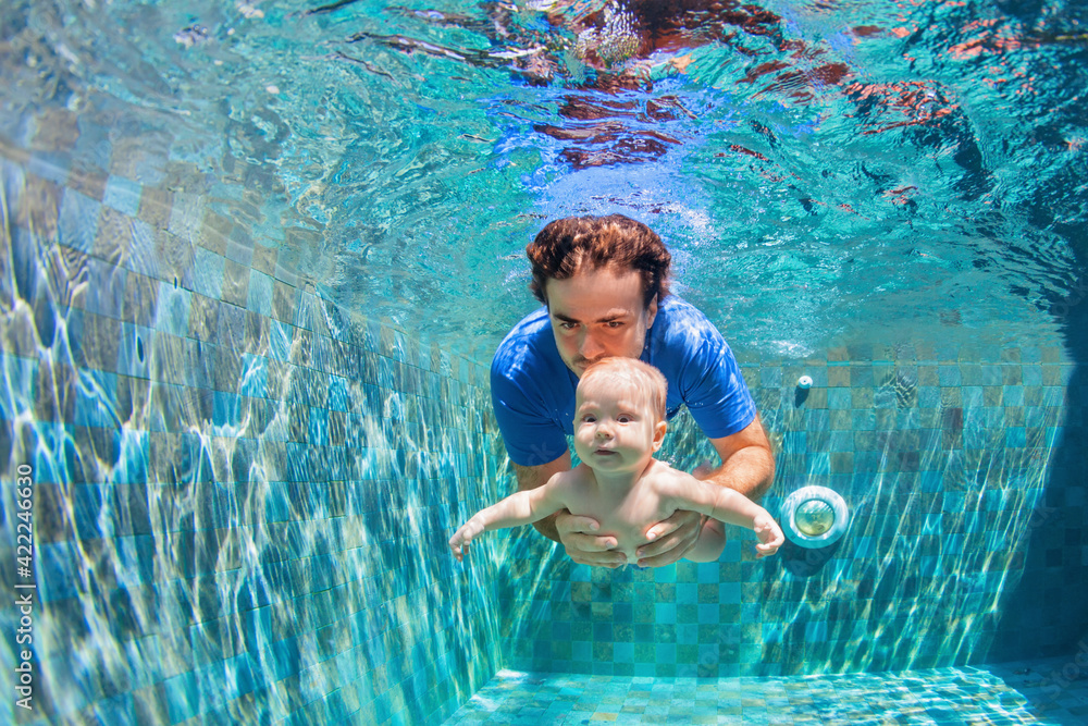 Happy people dive underwater with fun. Funny photo of father, child in ...