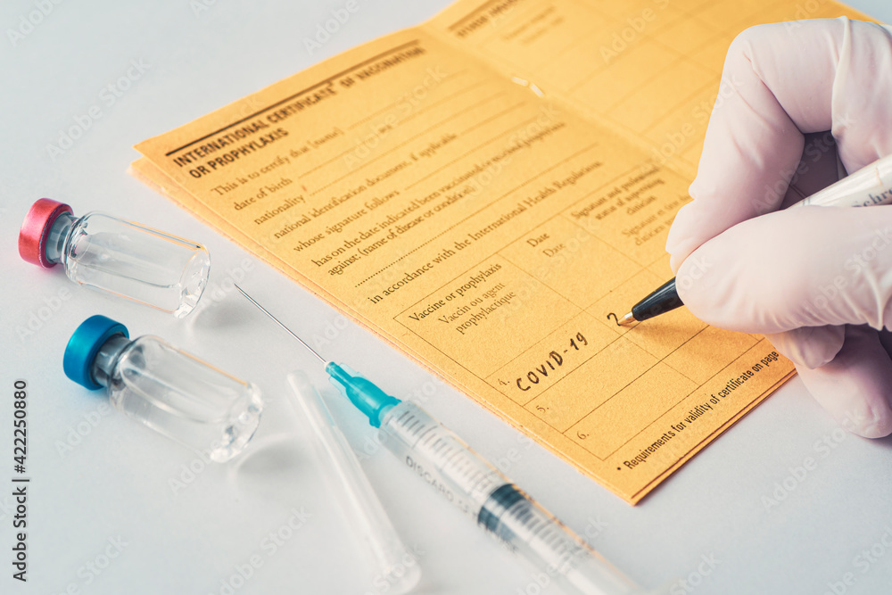 Fotografia do Stock: Vaccination certificate and injection, vaccinated ...