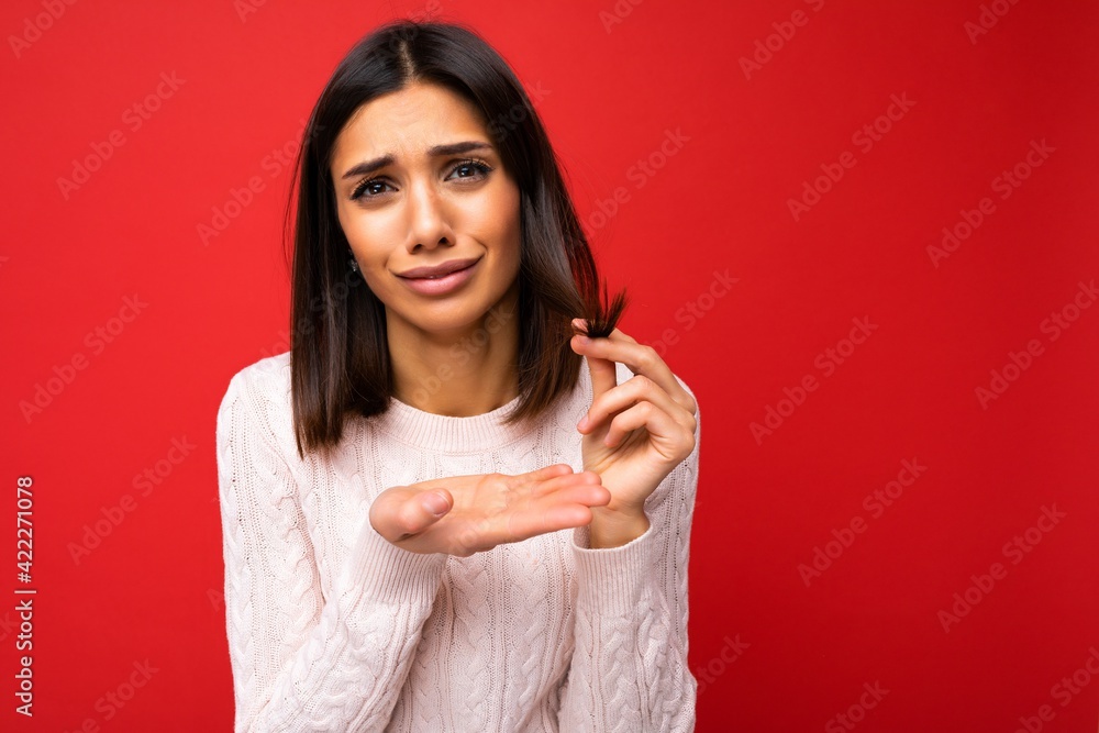 Portrait of attractive sad upset sorrowful young brunette woman wearing ...