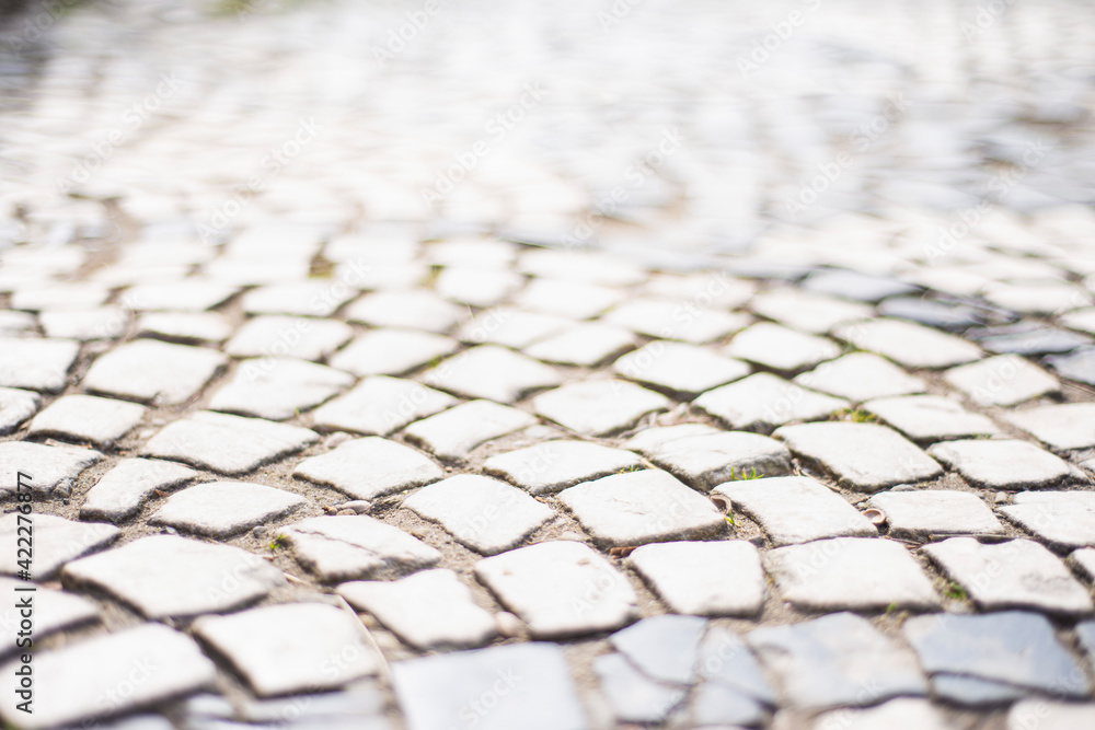 stone pavement texture, old square tiles on the road and sidewalk, old ...