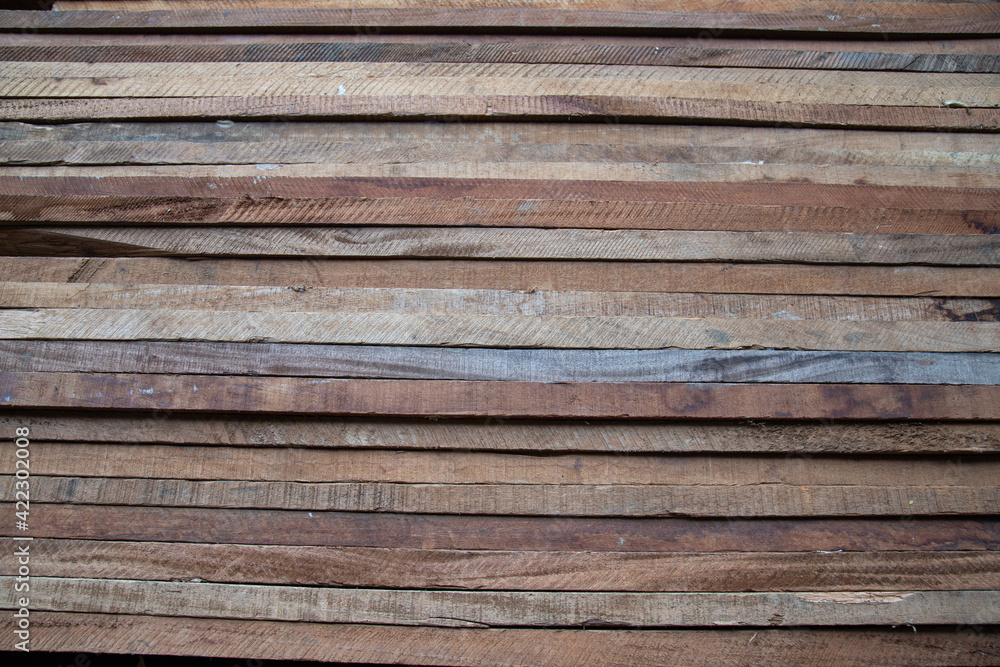 Planks of different types of wood aligned and stacked Stock Photo ...