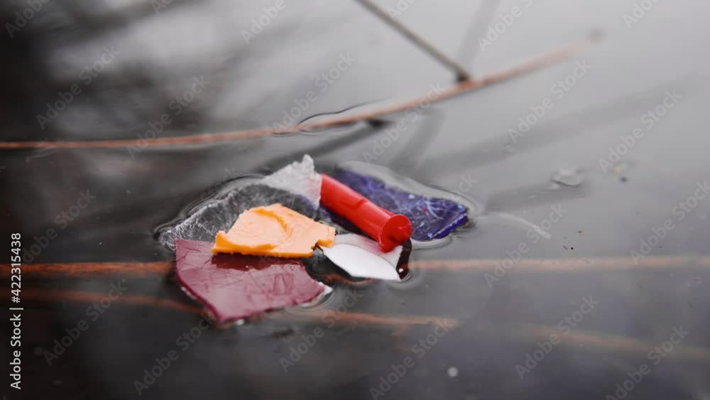 Residue of plastics in a river stream. Sea shore polluted with ...