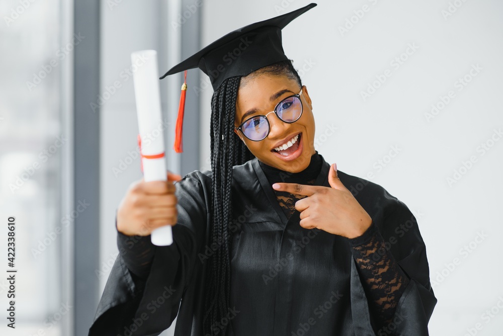 pretty african female college graduate at graduation Stock Photo ...