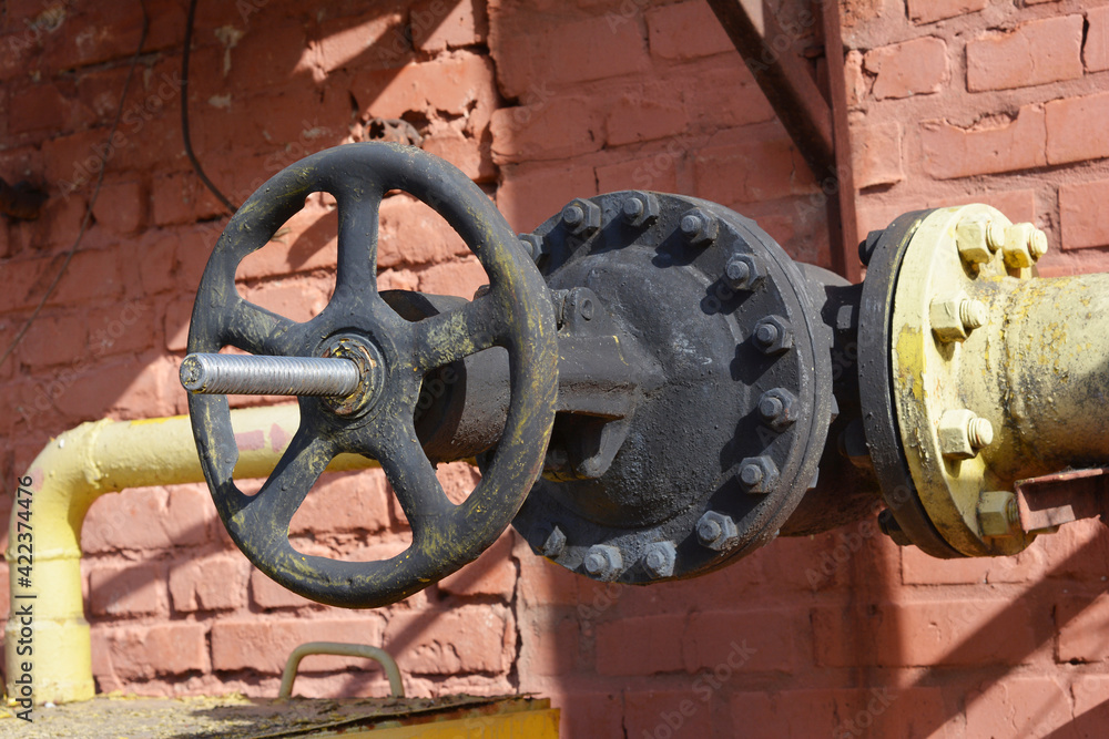 Cut off natural gas supply. Turning on the gas supply by rotating the ...