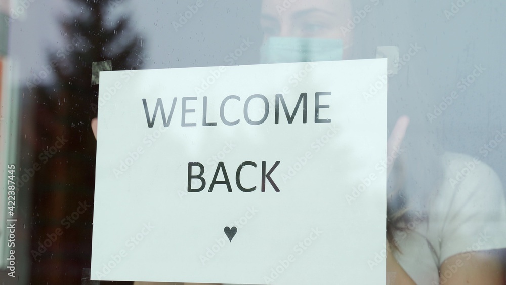 Woman stickers Welcome back re-opens after the end of the coronavirus ...