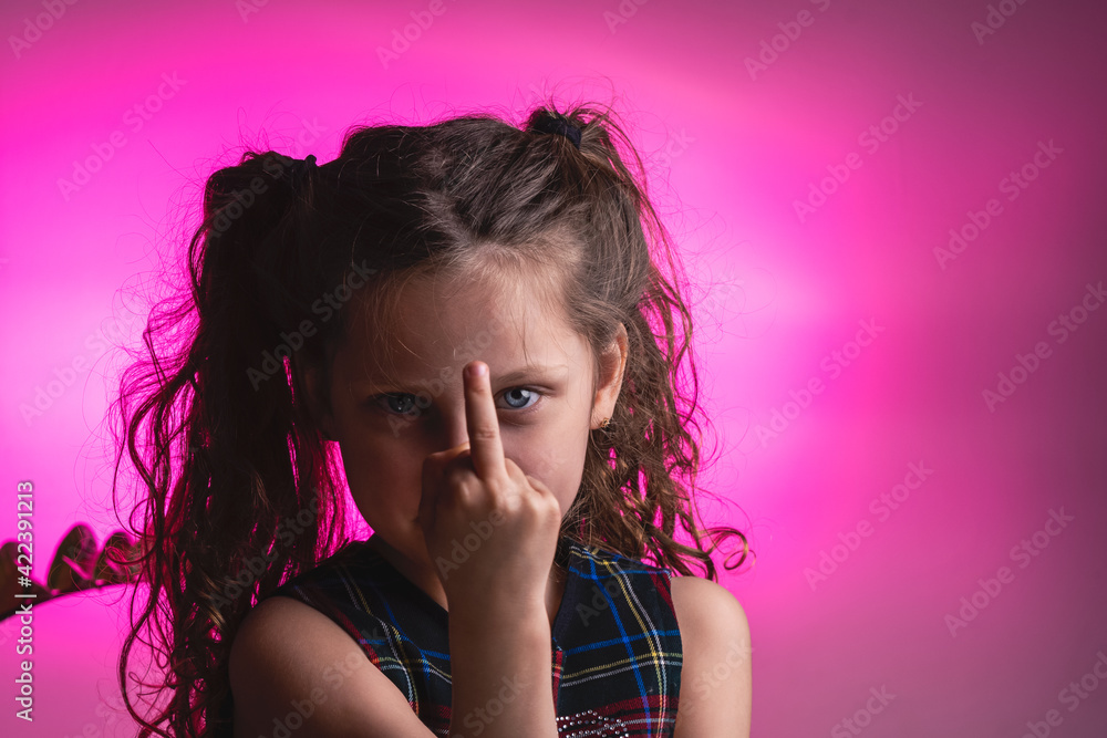 portrait of a little girl showing the middle finger Stock Photo | Adobe ...