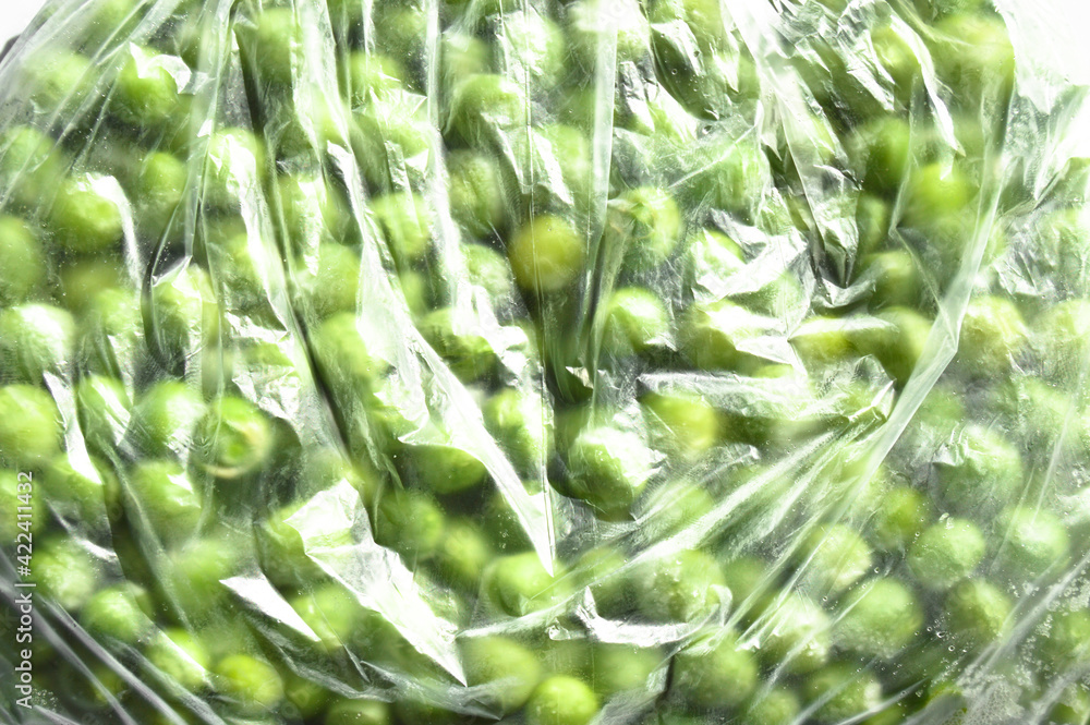 Frozen fresh green and peas grains in sachets, nutritious and healthy ...