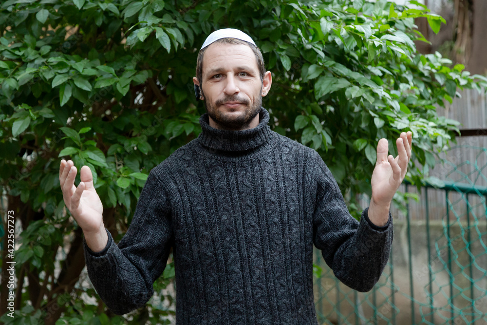 Jewish man wearing kippah in Hebrew or yarmulke (cloth cap ...