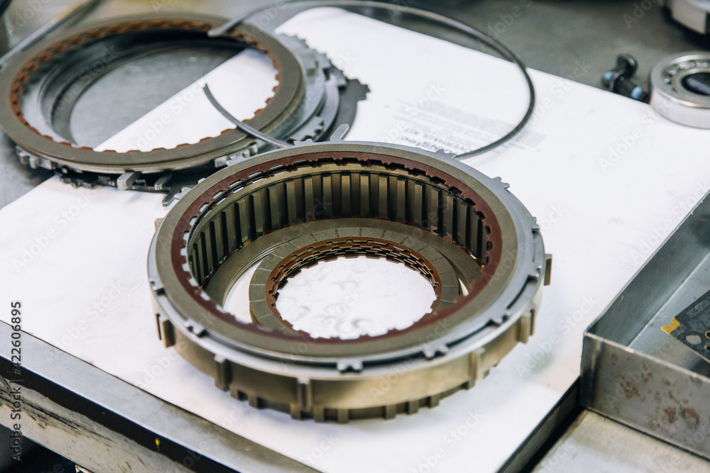 Set of various engine and gearbox spare parts. Shiny gears for ...