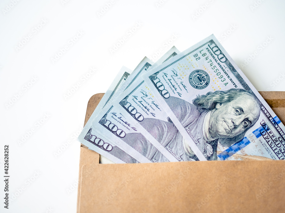 Money in envelope on white background. Cash in envelope. Dollar bill ...