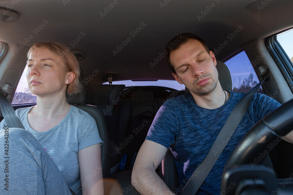 Tired husband falls asleep driving car at fast speed with sad wife ...