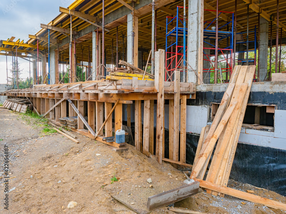 Construction works. Erection of a two-story building. Long building ...