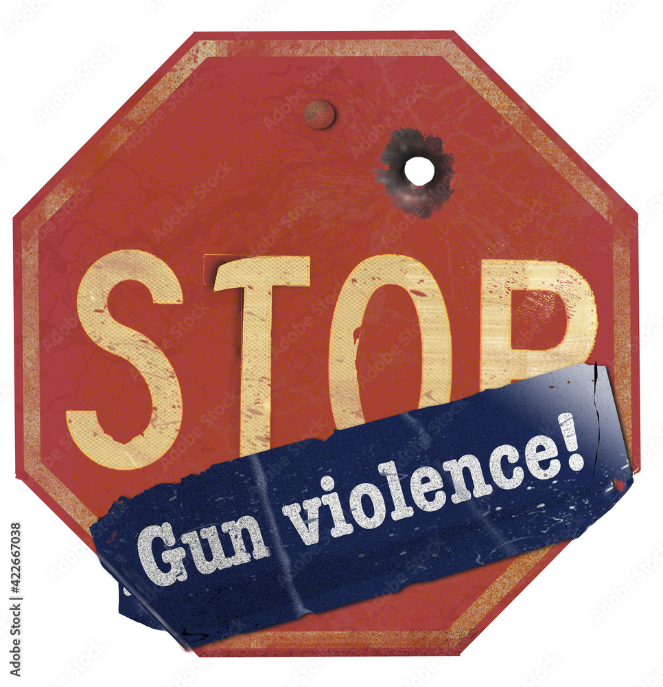 A stop gun violence sticker is seen on a traffic stop sign that has a ...