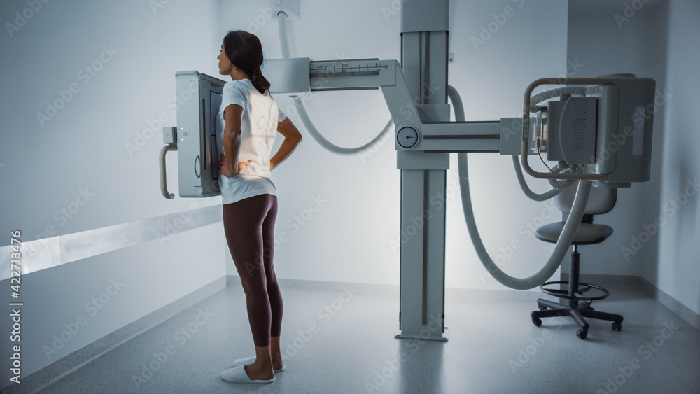 Hospital Radiology Room: Beautiful Multiethnic Woman Standing in the X ...