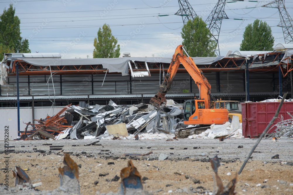 Demolition machines on a construction site Stock Photo | Adobe Stock