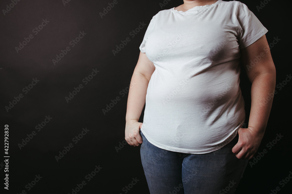 Fat people. Overweight woman at studio background Stock Photo | Adobe Stock