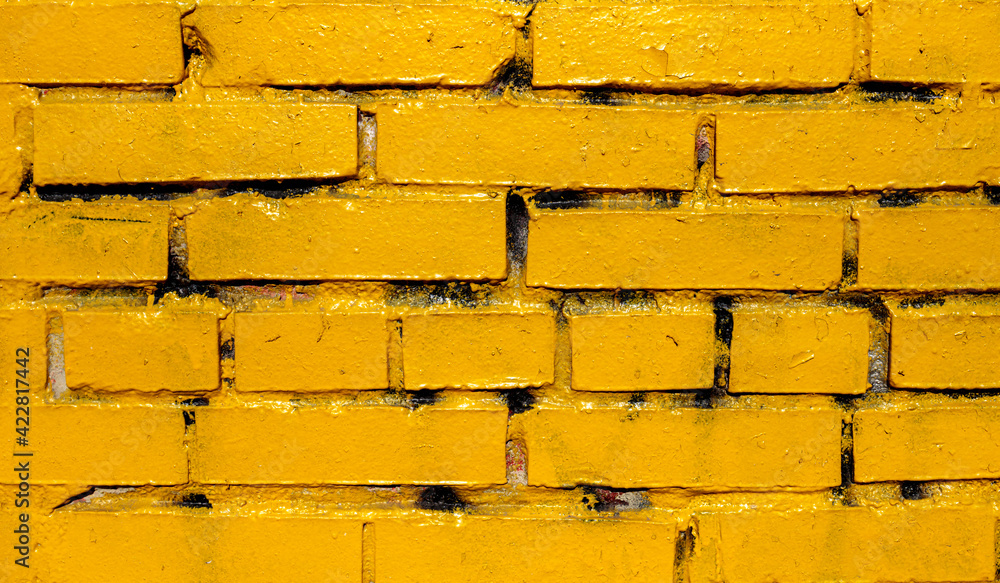 yellow brick wall, structure of stone and cement Stock Photo | Adobe Stock