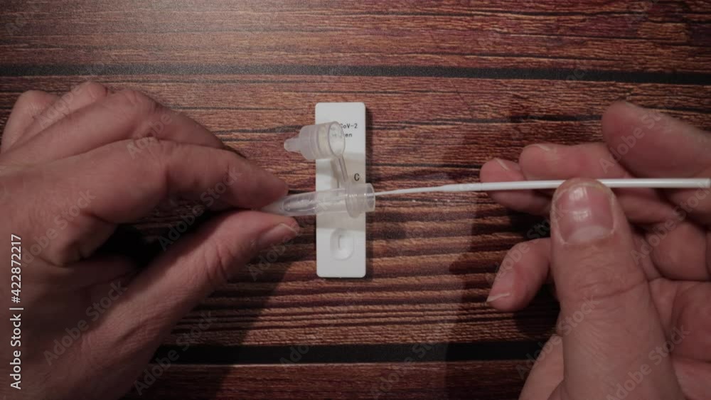 Applying a Corona Rapid Test - Covid-19 Antigen Test - Sars COV 2 ...