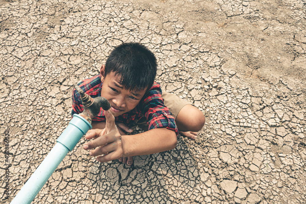 The little boy waiting for drinking water to live through this drought ...