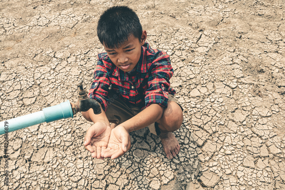 The little boy waiting for drinking water to live through this drought ...