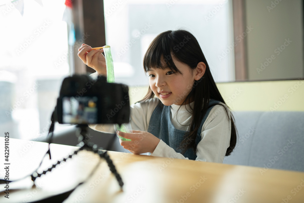 Girl Streaming Stock Photo | Adobe Stock