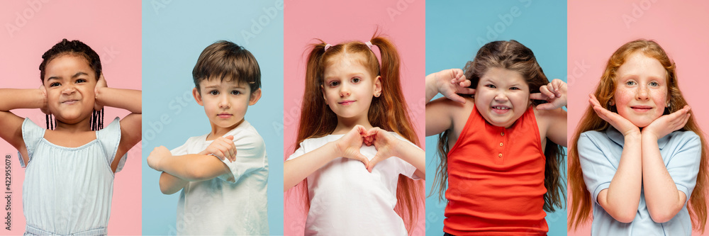 Young and happy kids gesturing isolated on multicolored studio ...