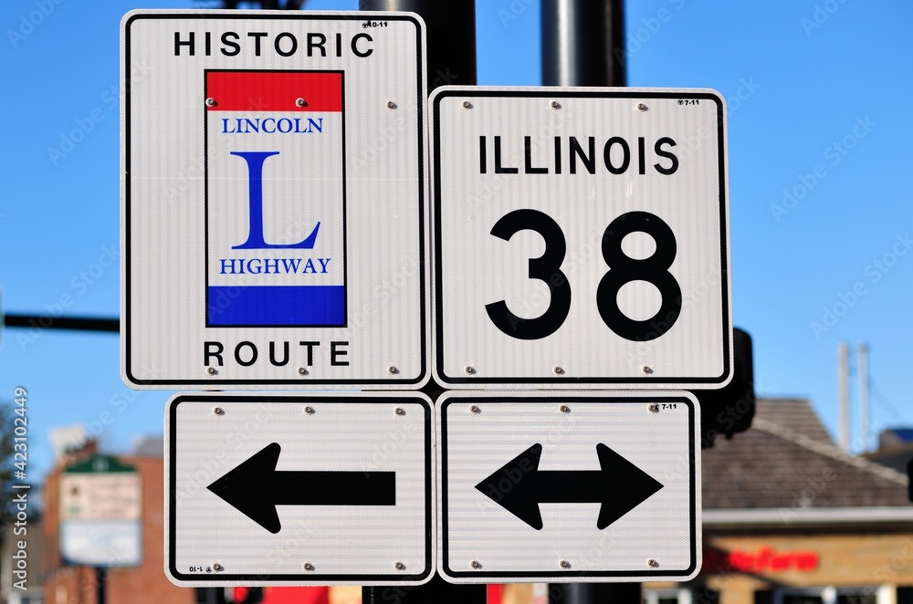 Highway road signs provide direction and identify an Illinois state ...