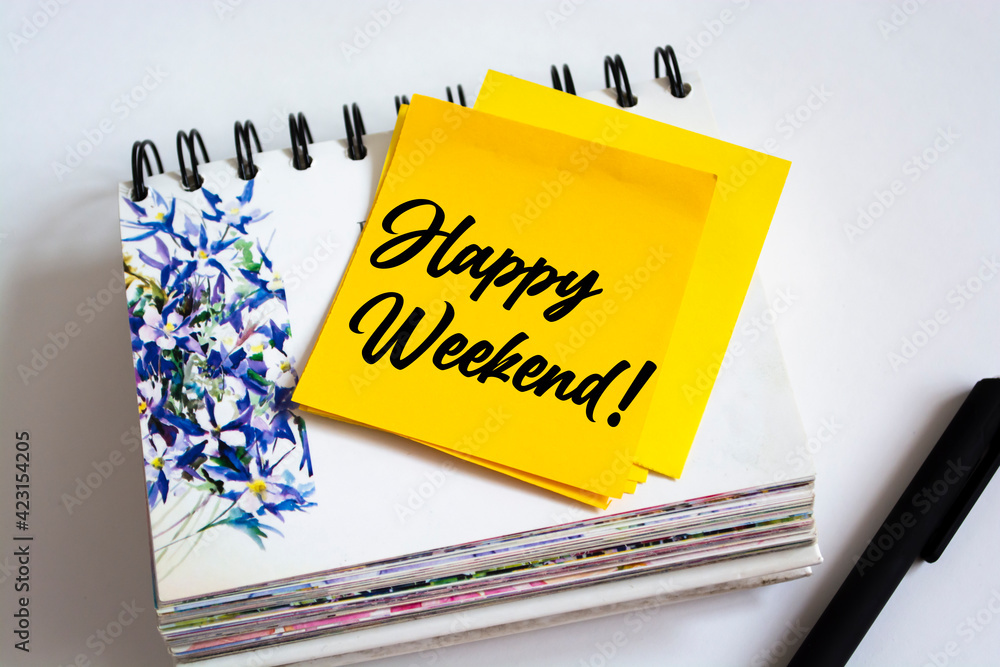 Work place concept - Office Desk with Notes About Happy Weekend with ...