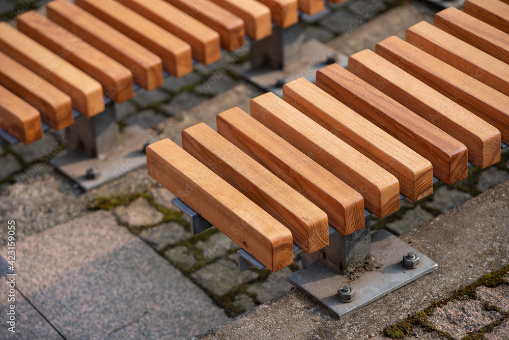 Lots of wooden rounded benches in an empty amphitheater outside in the ...