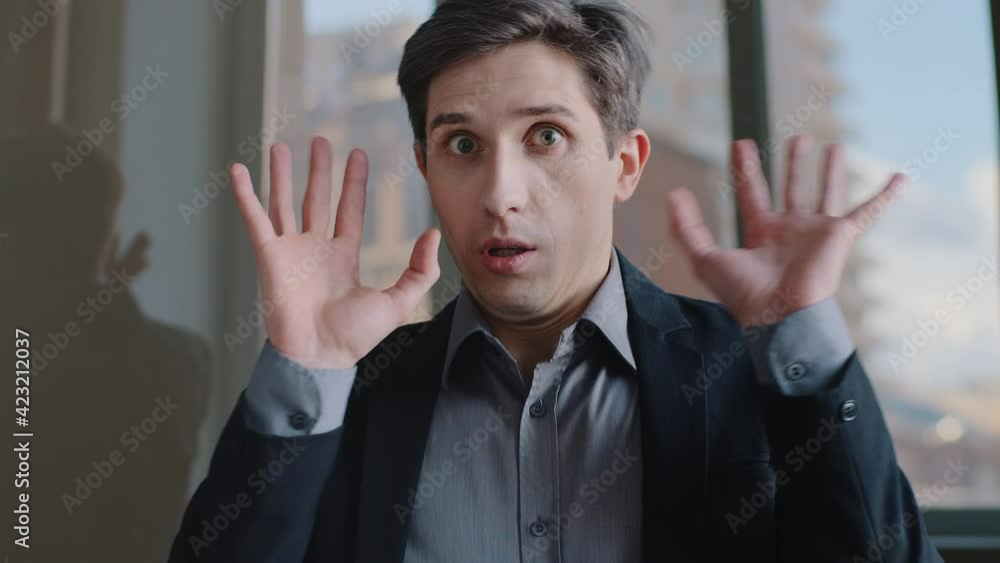 Vídeo do Stock: Portrait of caucasian scared business man successful ...