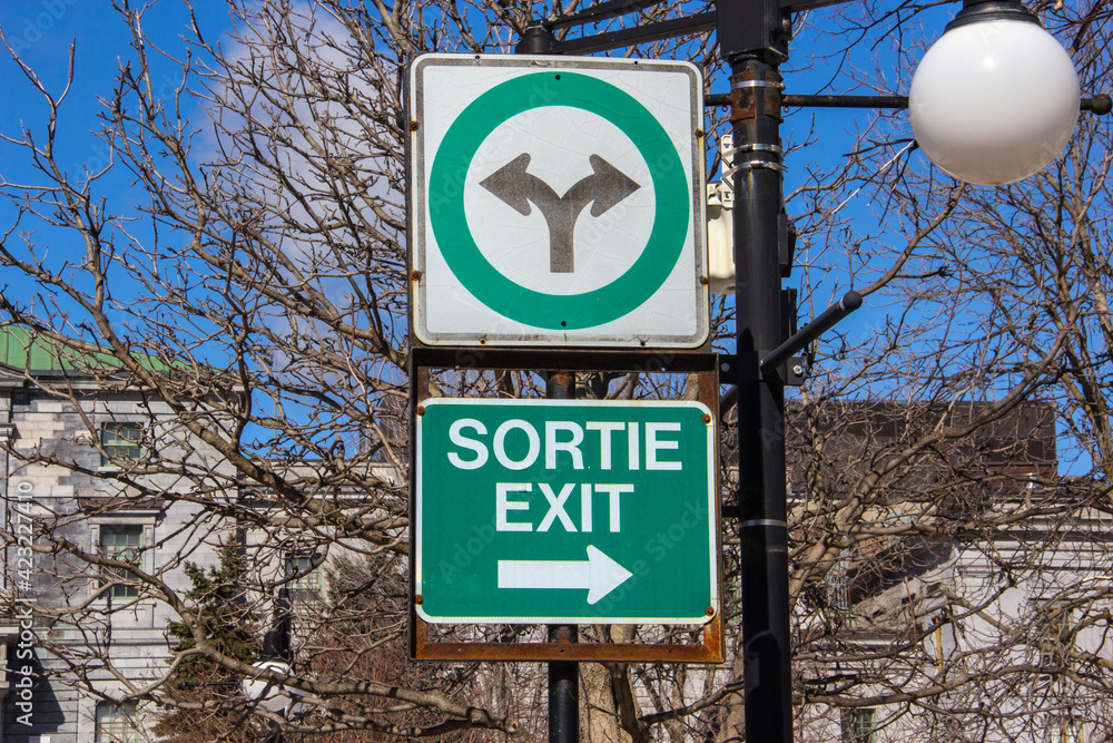 Left or right turn, bilingual exit traffic signs Stock-Foto | Adobe Stock