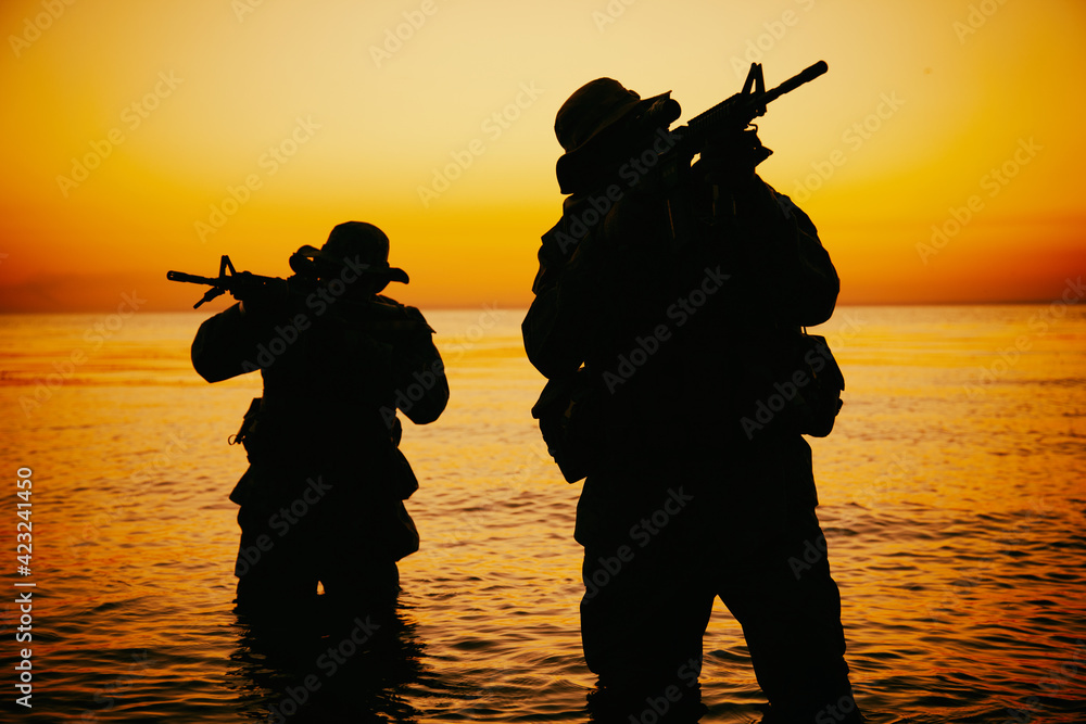 Two commando soldiers, army special operations fighters aiming assault ...