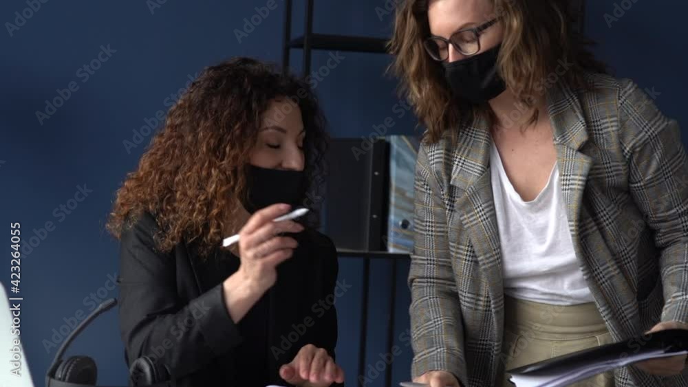 Female secretary bringing for signature documents for signing to ...