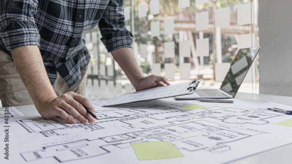 Architectural building design and construction plans with blueprints ...