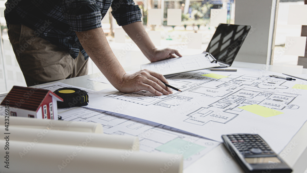 Architectural building design and construction plans with blueprints ...