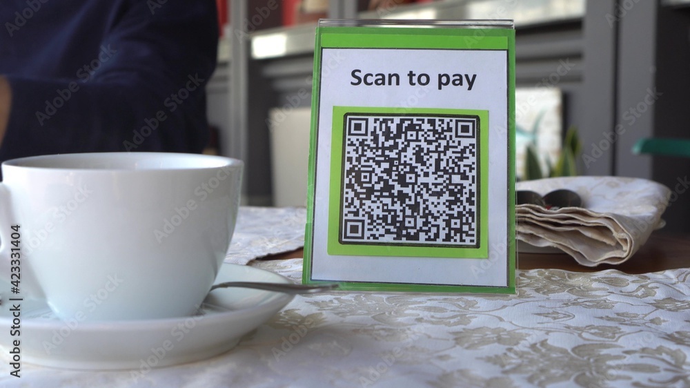 QR code touch-free payment display in the retail store. To use a QR ...