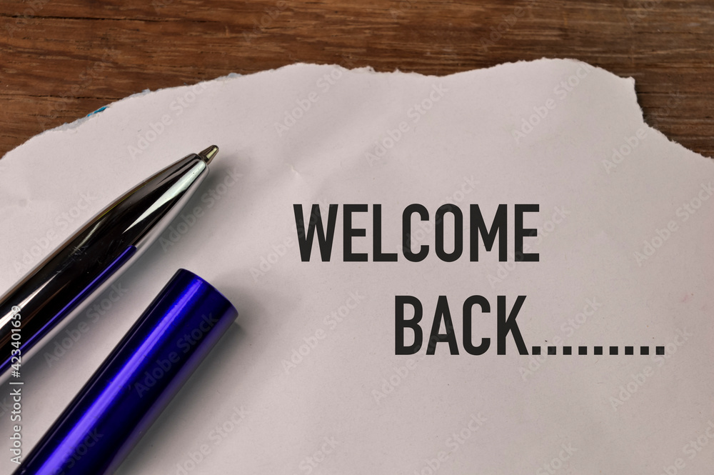 Top view of pen and torn paper written with text WELCOME BACK Stock ...