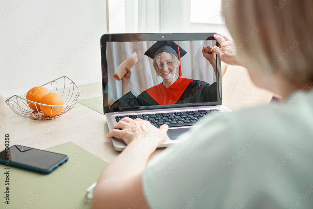 Virtual graduation and convocation ceremony. Senior woman ...