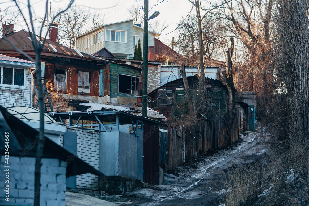 Old houses on low-rise street in old poverty part of Voronezh in Russia ...