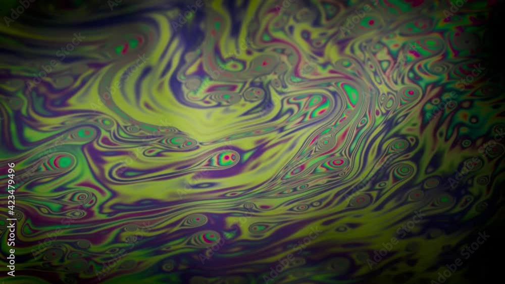 Colorful close-up surface of a soap bubble with abstract psychedelic ...