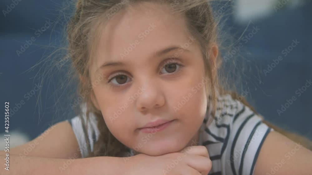 Happy little girl smiling. Close-up of a child face. The girl face with ...