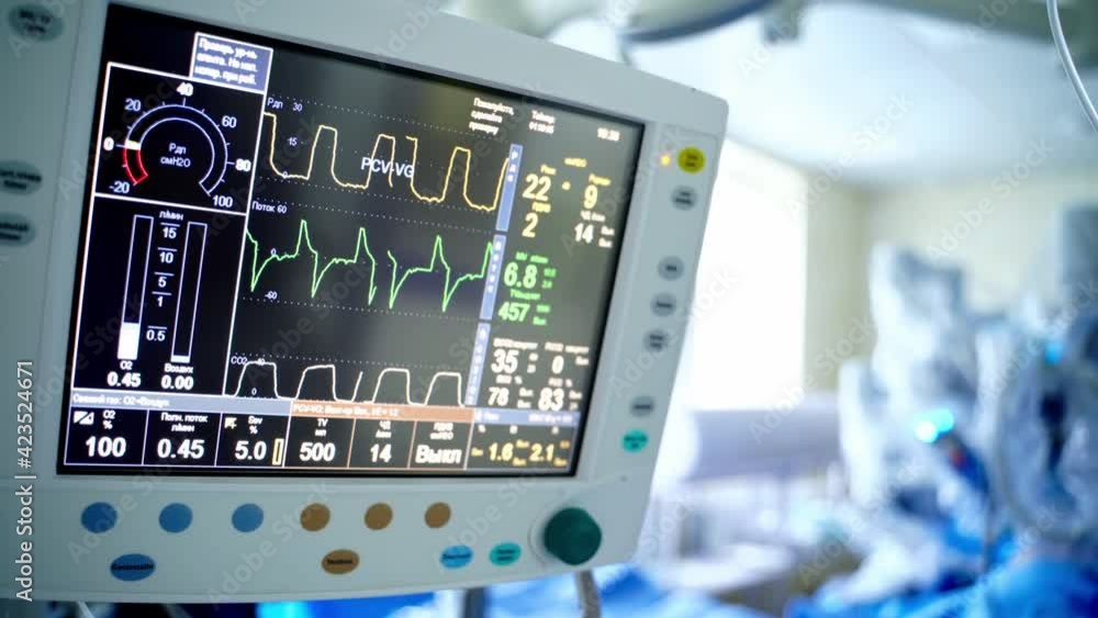 Signs of patient's condition on the screen. Heart rate monitor on blur ...