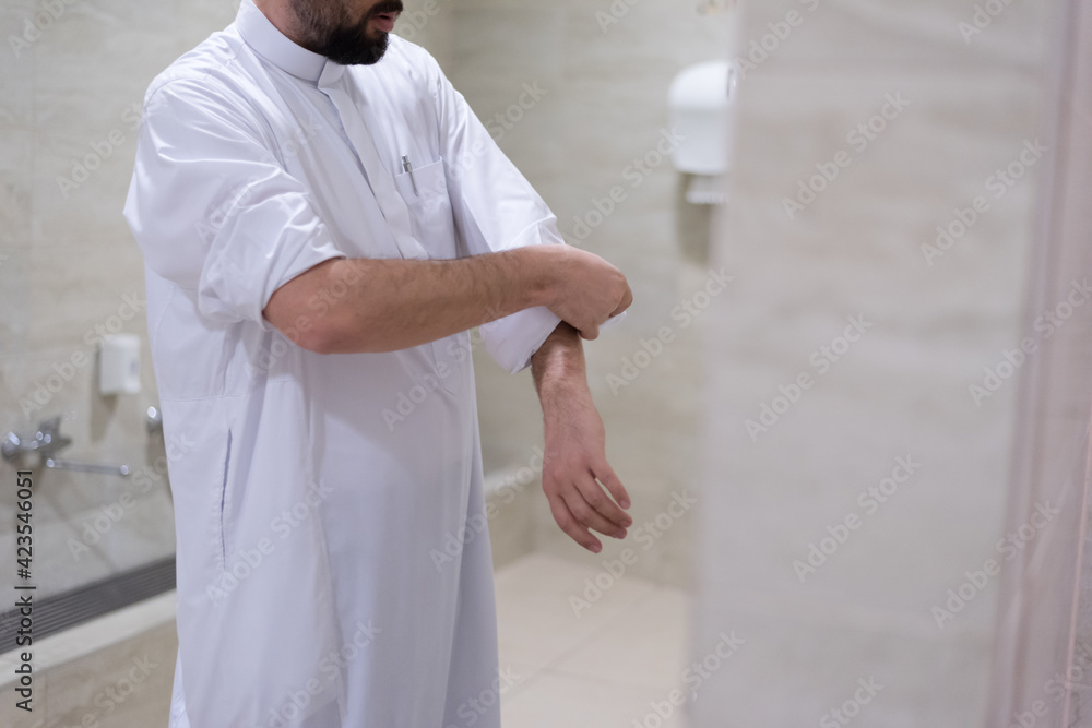 Muslim man taking ablution for prayer. Islamic Religious Rite Ceremony ...
