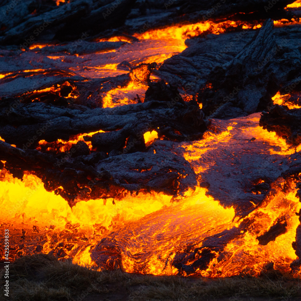 Lava flows from a small volcanic eruption in the Geldingardalur Valleys ...