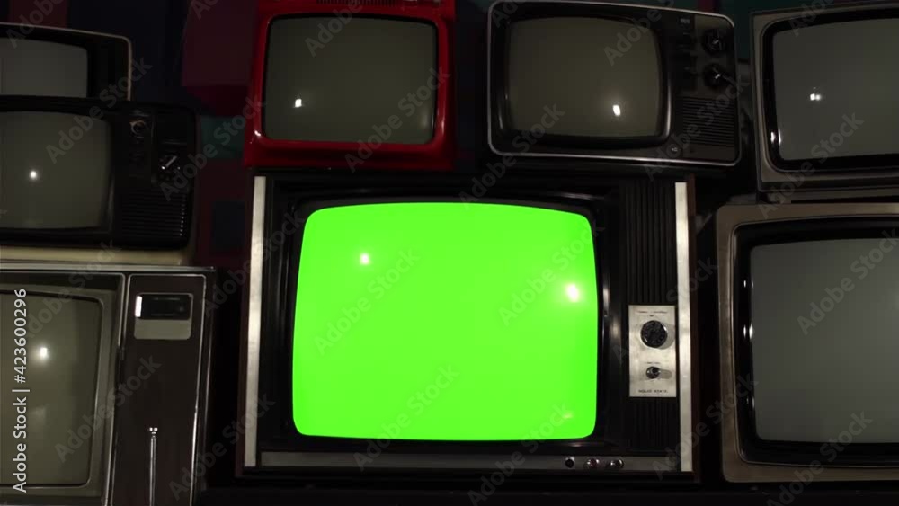 Retro TV Set with Green Screen in the Middle of Many Retro TVs. Dolly ...